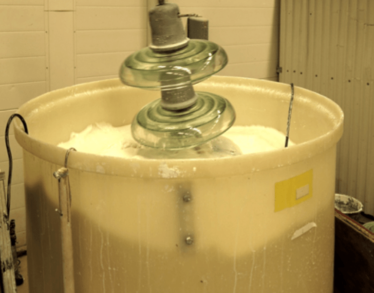 Full-Scale Testing of HVDC Insulators for High Salt/High Icing ...