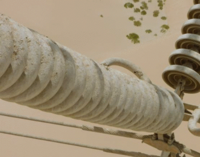 Performance of Coated Porcelain & Glass Insulators After 15 Years ...